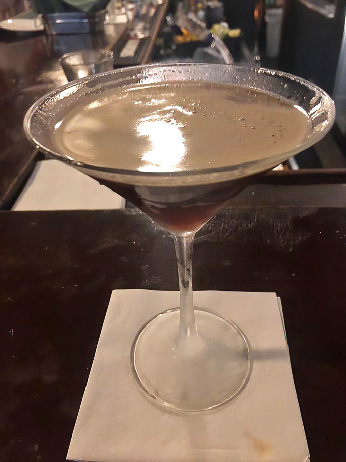 The martini glass isn't just holding a cocktail &ndash; it's cradling liquid sophistication that perfectly caps an evening of culinary indulgence.