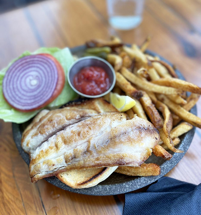 This fish sandwich isn't just lunch; it's what happens when the catch of the day decides to dress up and go to town.