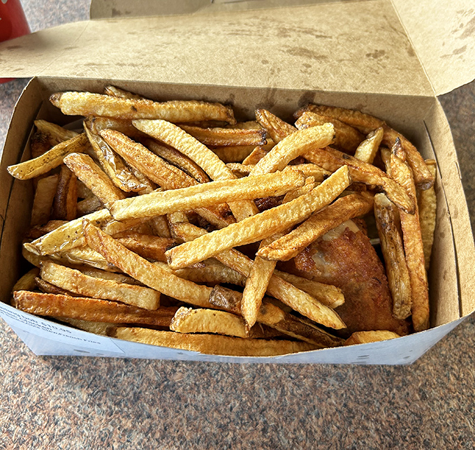 These aren't just french fries&mdash;they're supporting actors in the chicken show, ready to soak up every last drop of that legendary sauce.