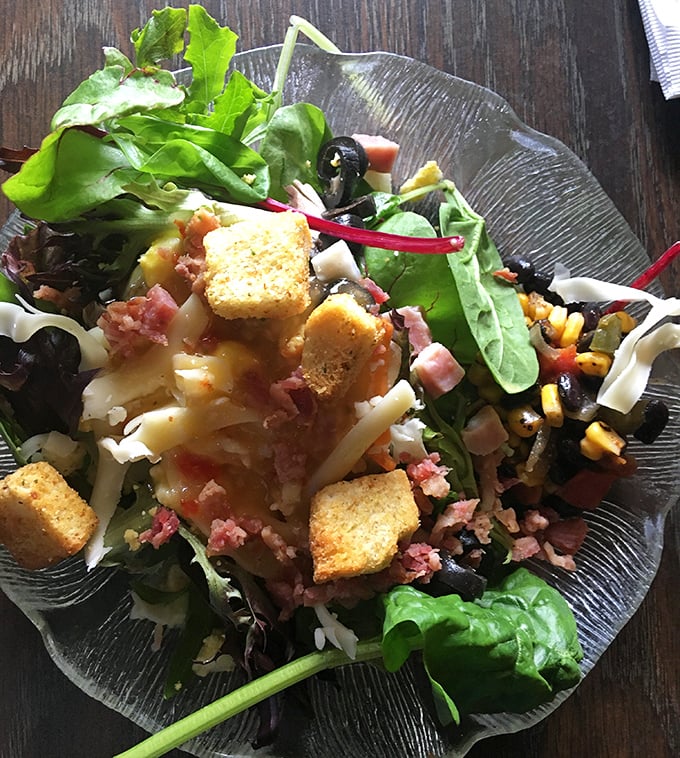 Fresh greens piled high with bacon and croutons &ndash; because salad should never feel like punishment for enjoying life.