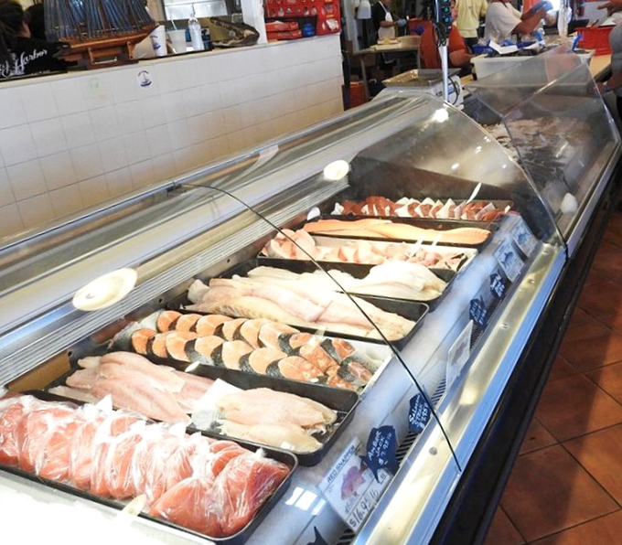 The seafood display case: where your dinner makes eye contact before making its way to your plate.