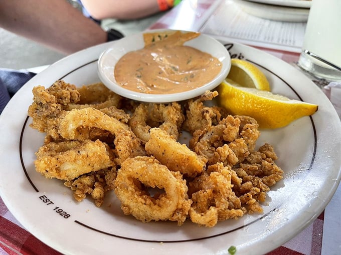 Crispy calamari that would make Mediterranean fishermen nod in approval. That squeeze of lemon isn't optional&mdash;it's the exclamation point this dish deserves.