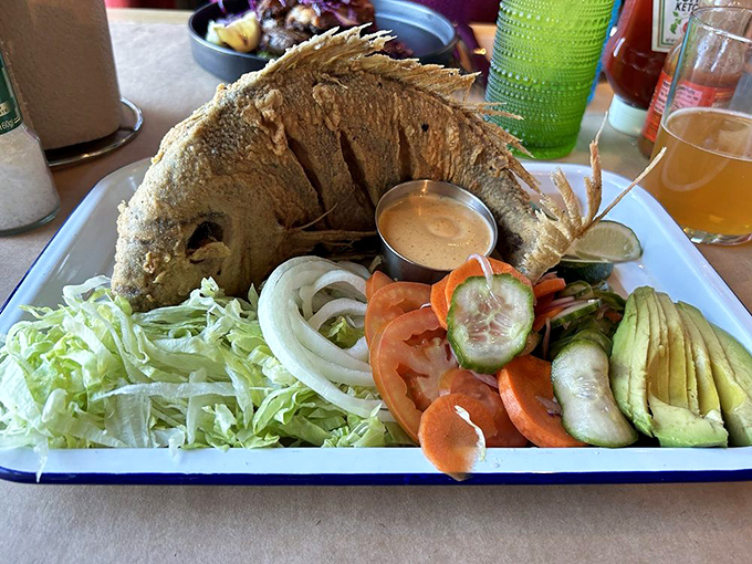 A whole fish that stares back at you with pride, as if to say, "Yes, I'm delicious, and yes, I'm worth every penny of that dry cleaning bill."