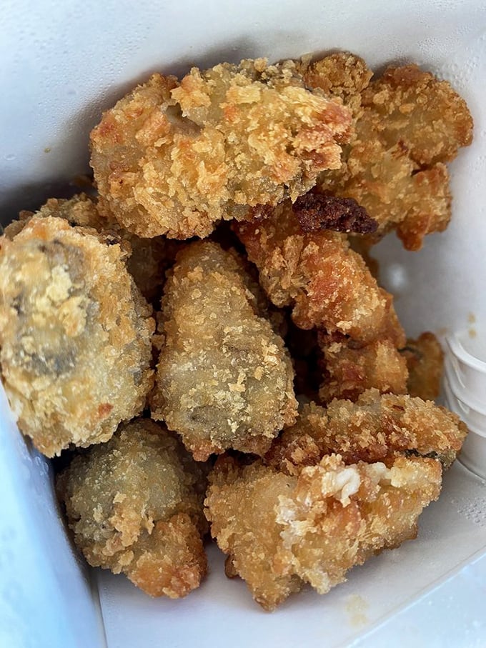 Crispy fried oysters that crunch like autumn leaves but taste like the ocean's greatest gift to mankind.