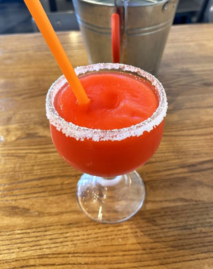 That salt-rimmed frozen margarita isn't just a drink&mdash;it's the perfect cool companion for spice-laden seafood. Like finding an oasis in a desert of heat.