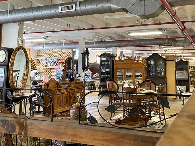 An elegant arrangement of antique furniture creates a vignette that whispers, "Your living room could look this distinguished if you'd just take me home."