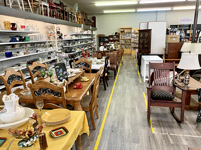 Dining sets arranged like they're waiting for dinner guests, proving that secondhand furniture often has more character than anything from a catalog.
