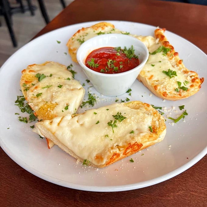 Garlic bread done right &ndash; golden, buttery, and guaranteed to make you forget about any diet resolutions.