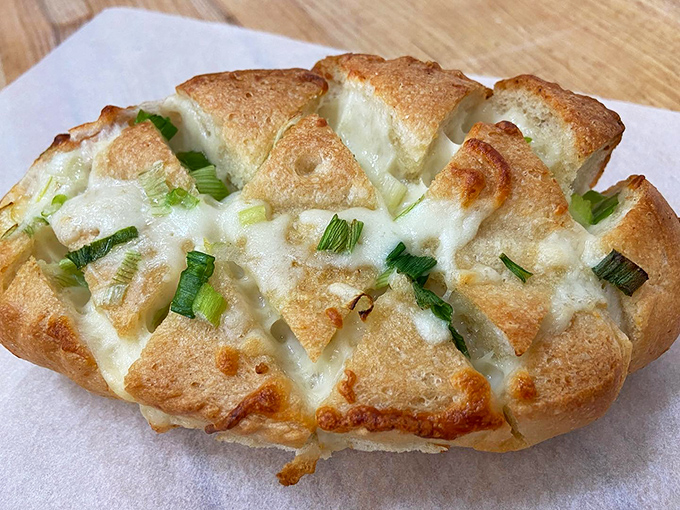 Garlic bread elevated to an art form. The cheese pulls away in strings that would make a violinist jealous.