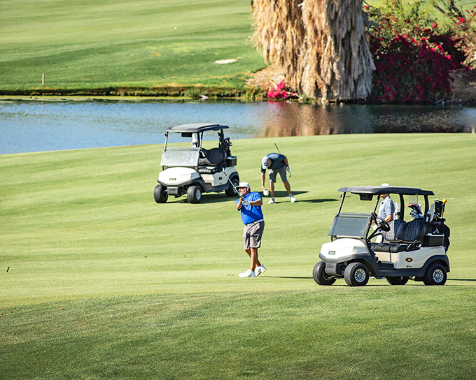 Golf isn't just a game here; it's the community's social heartbeat, where friendships form between putts and good-natured ribbing.