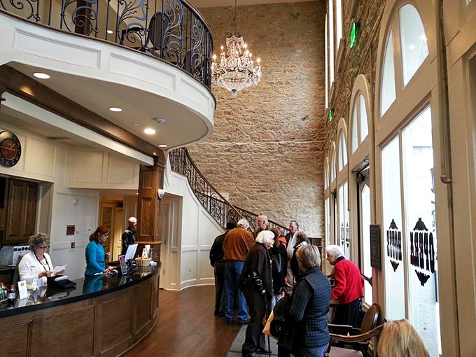 The Opera House lobby welcomes visitors with soaring ceilings and limestone walls—a dramatic entrance worthy of the performances within.