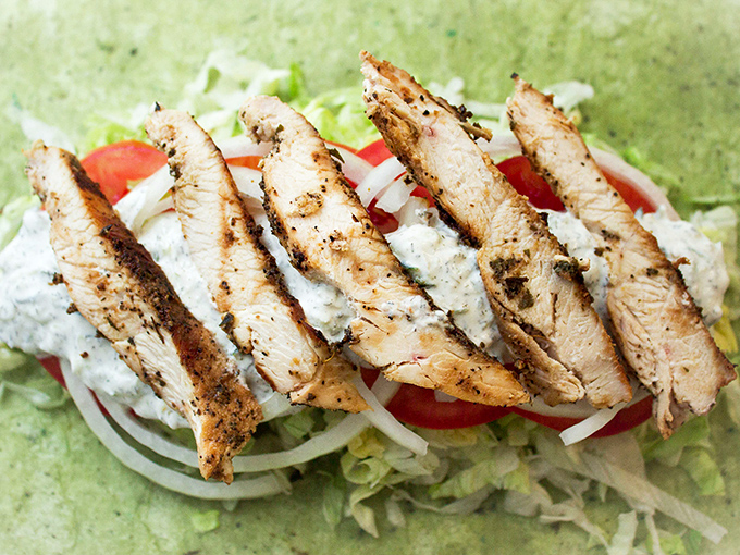 Grilled chicken, fresh veggies, and tzatziki wrapped up like a present. It's what Zeus would eat for lunch if he vacationed in Florida.