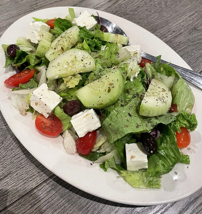 A Greek salad so fresh and vibrant, it practically sings "Zorba the Greek" while you eat every colorful bite.