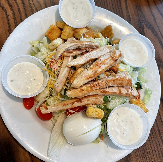 A salad so generous it makes other salads look like garnish. Those dressing cups aren't suggestions&mdash;they're an invitation to indulge.