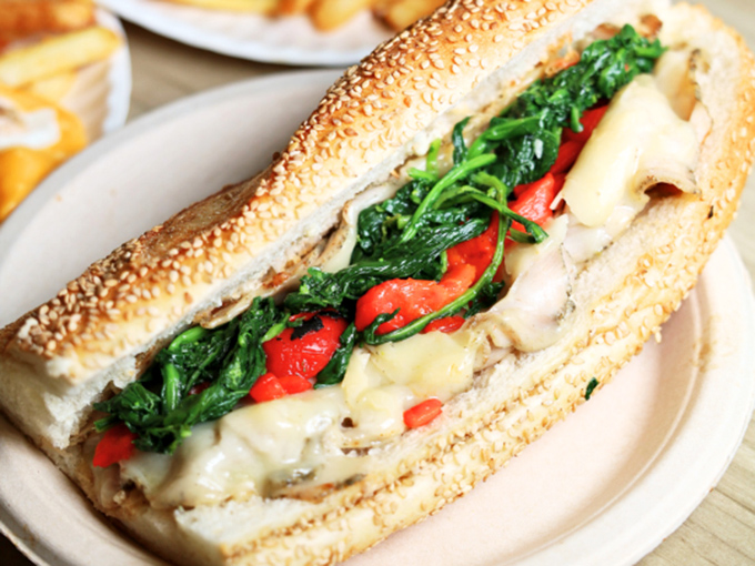 The grilled veggie hoagie proves that vegetables can party just as hard as their meaty counterparts. Green has never looked so glorious.