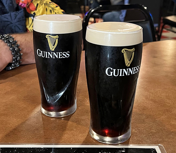 Two perfect pints of Guinness with that signature creamy head. The ideal companion to anything on the menu.