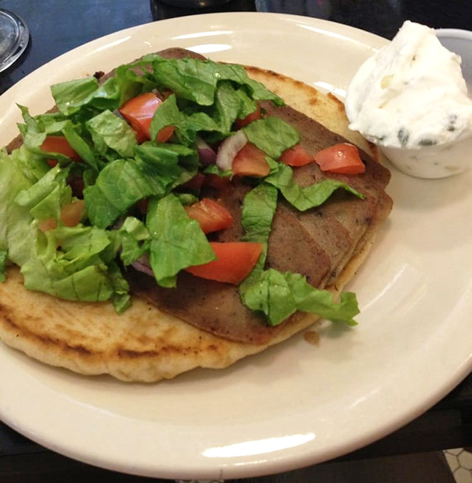 Simple yet profound—seasoned meat, fresh vegetables, and a side that doesn't pretend to be anything but what it is: honest-to-goodness comfort food.