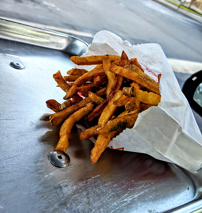 These hand-cut fries aren't just a side&mdash;they're the supporting actors who sometimes steal the show, crispy on the outside and fluffy within like potato perfection should be.