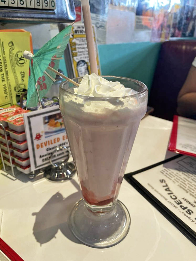 That little umbrella isn't just decoration&mdash;it's marking the spot where tropical vacation vibes meet classic diner indulgence in a frosty glass.