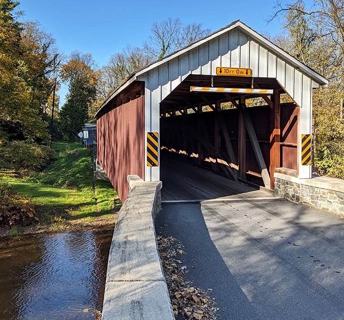 The historic Siegrist's Mill Covered Bridge stands as a postcard-perfect reminder that sometimes the scenic route is the only way to travel.