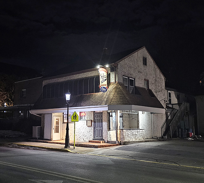 Night transforms this stone building into something magical. Like Edward Hopper painted a small-town nocturne, but with better lighting.