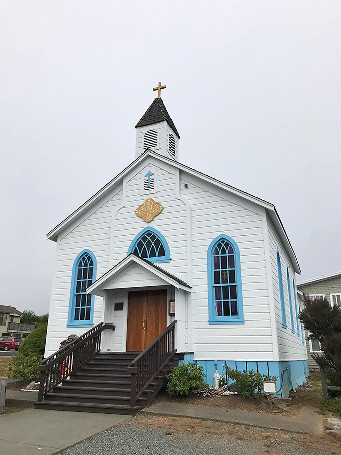 Holy architecture, Batman! This picture-perfect church with its blue-trimmed windows looks like it was plucked straight from a New England postcard.