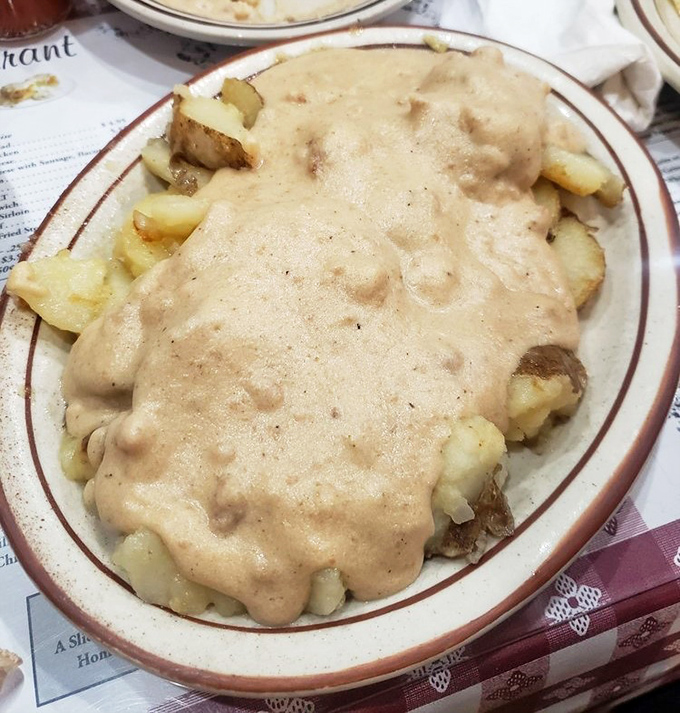 Home fries smothered in gravy because sometimes more is definitely more delicious.