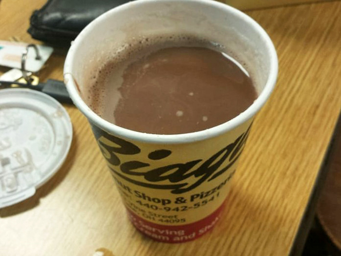 Hot chocolate served in a cup that screams "we care about the little details" louder than words.