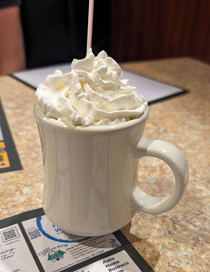 Hot chocolate that doesn't just have whipped cream&mdash;it has a whipped cream hat worthy of the Kentucky Derby.