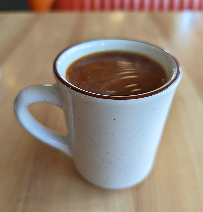 In a world of complicated coffee concoctions, there's something poetic about a simple mug that promises warmth without asking for your email address.