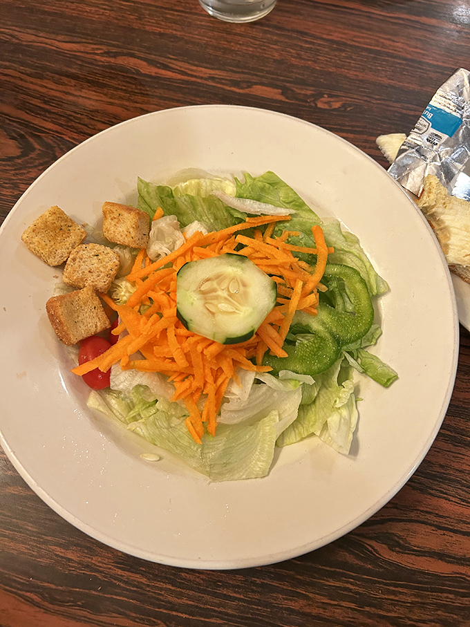 Even the house salad gets the royal treatment with fresh vegetables and homemade croutons.