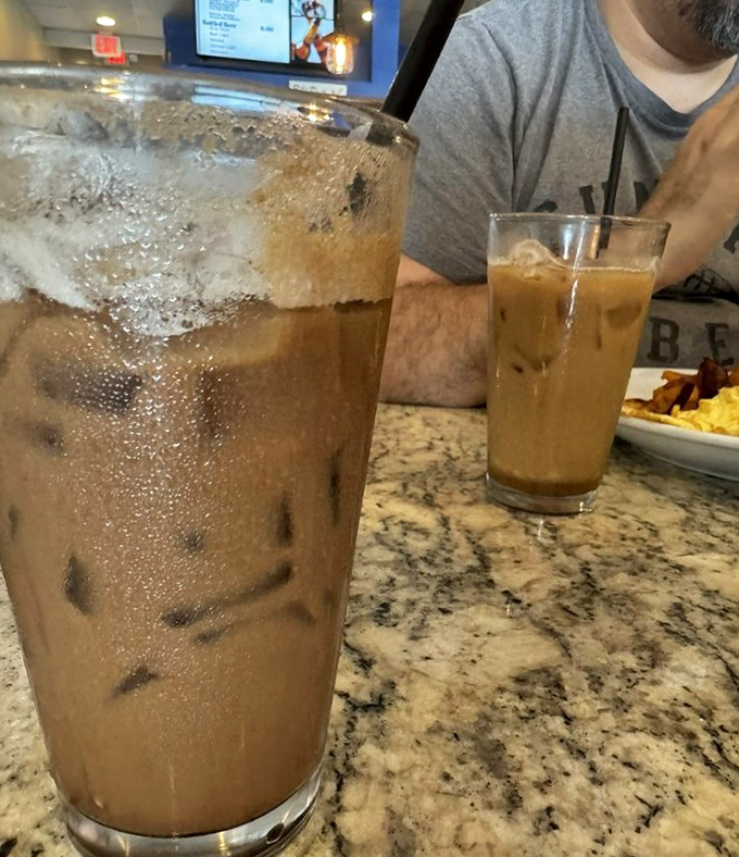 Iced coffee that looks strong enough to jumpstart a car battery. In Florida's heat, this caffeinated elixir isn't just a beverage—it's survival equipment.
