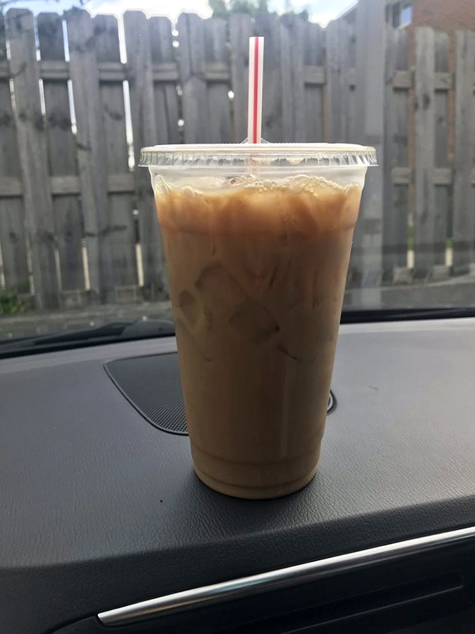 That iced coffee isn't just a beverage; it's the perfect co-conspirator for your donut adventure, silky and strong.