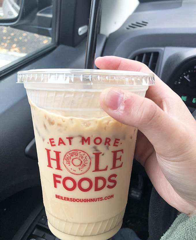 That moment when your coffee comes in a cup that perfectly captures the philosophy of life: Eat More Hole Foods.