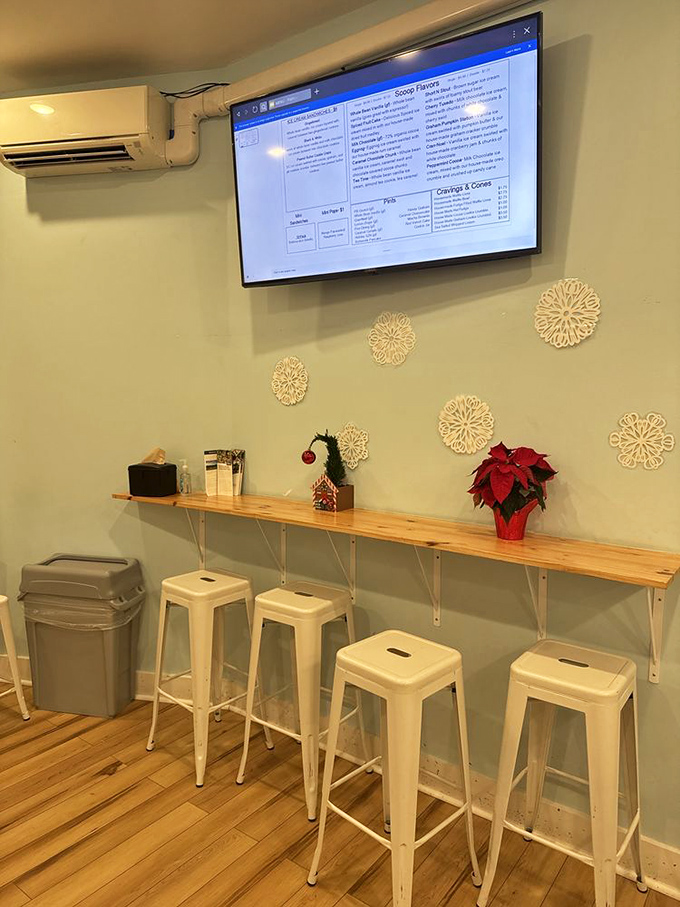 Modern ice cream sanctuary with vintage soul. White stools invite you to perch and contemplate the deeper meaning of seasonal flavors.