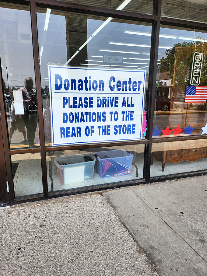 The donation center sign &ndash; where the circle of stuff begins. Every treasure inside once belonged to someone who decided it deserved a second chapter.