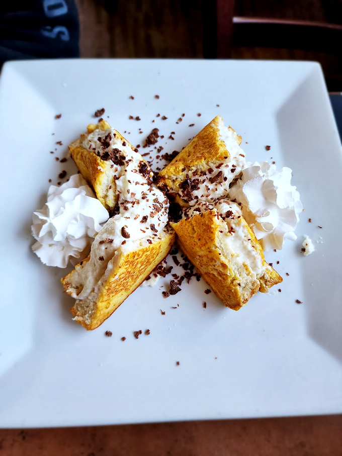 French toast that's dressed for success with cream, chocolate shavings, and a dollop of whipped cream. Breakfast or dessert? The line deliciously blurs.