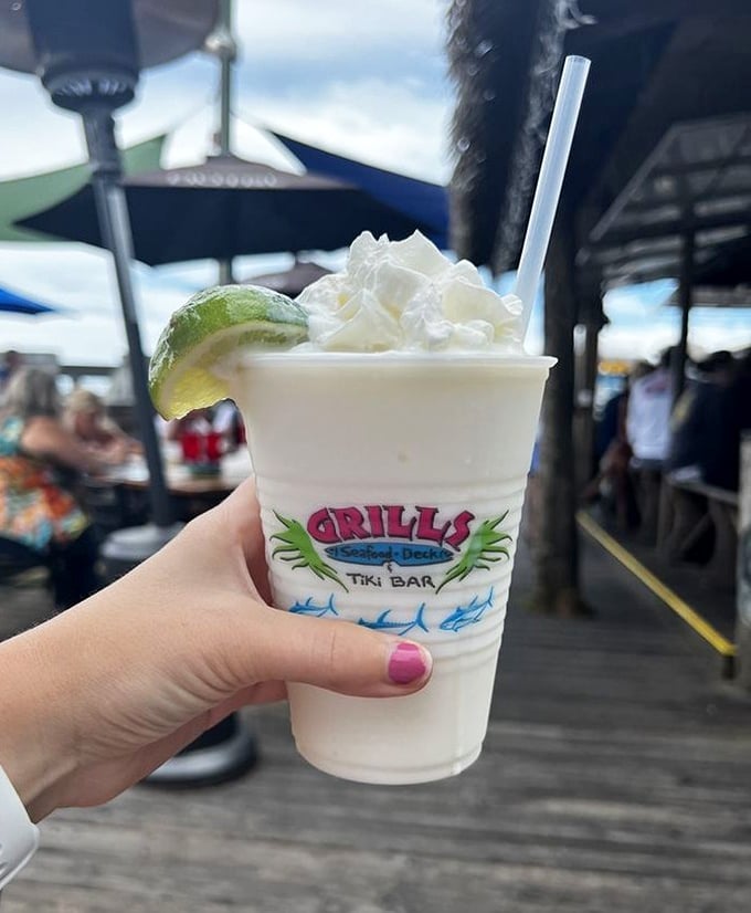 The Key Lime Colada&mdash;Florida's liquid sunshine served in a cup with a lime smile and whipped cream cloud.