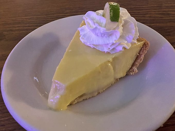 Key lime pie that strikes the perfect balance between sweet and tart. That dollop of whipped cream isn't decoration&mdash;it's the supporting actor in a citrus drama.