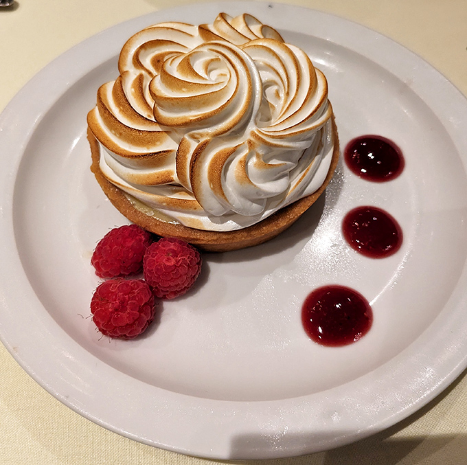 This isn't just dessert&mdash;it's architecture. Toasted meringue peaks shelter a tangy key lime filling, proving that Delaware knows its way around Florida's signature sweet.
