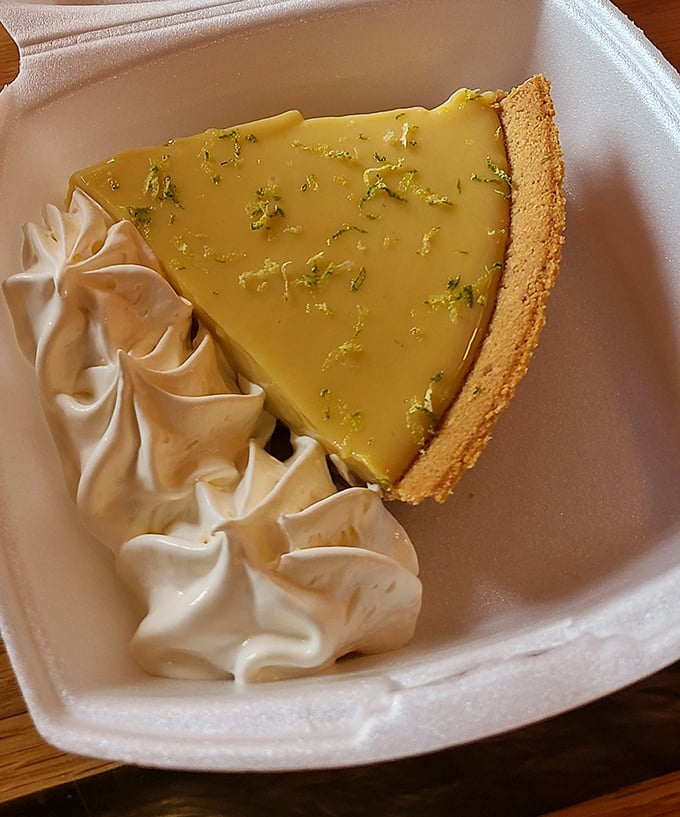 Key lime pie that strikes the perfect balance between tart and sweet. That dollop of whipped cream isn't optional&mdash;it's essential diplomacy.