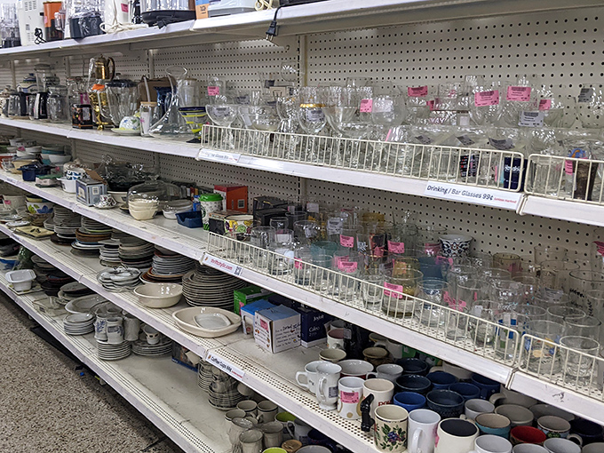 Dishes and glassware create a domestic archeological dig, where vintage Pyrex and forgotten mugs await their second chance at kitchen stardom.