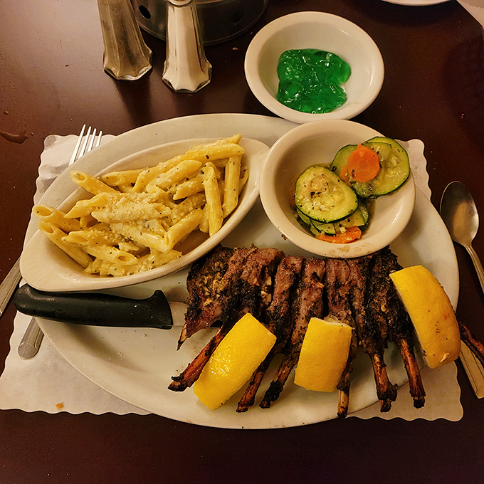 These lamb ribs aren't just dinner&mdash;they're a primal pleasure with a side of civilization. The pasta and vegetables provide balance, but we know why you're really here.