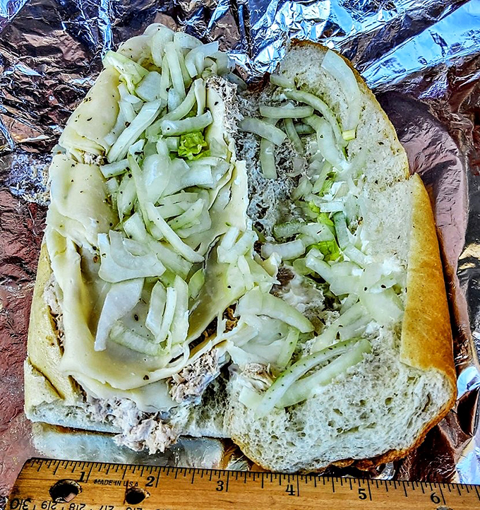 This tuna hoagie with its mountain of onions isn't just lunch &ndash; it's a commitment, a lifestyle choice, a relationship status.
