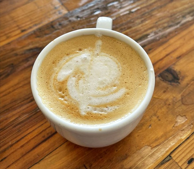 A latte that's both art and science &ndash; the foam creating a perfect canvas atop a foundation of rich espresso.
