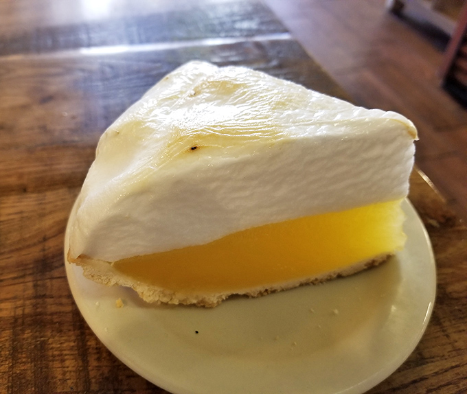 Lemon meringue pie with clouds of meringue so light they practically need their own weather system. Sweet, tart, and utterly irresistible.