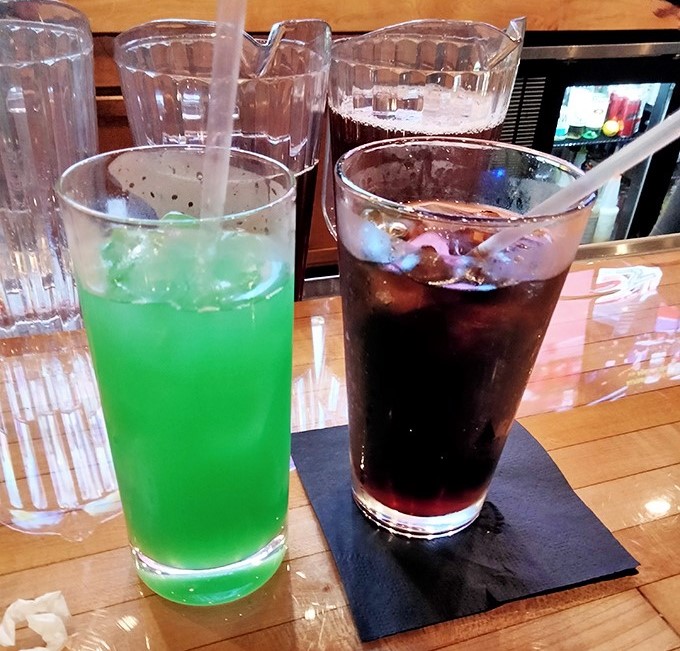 Even the drinks at Sweet P's bring the drama&mdash;this electric green concoction and classic cola offering visual proof that refreshment comes in all colors.