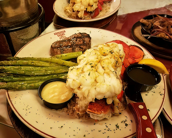 Surf meets turf in this glorious union of land and sea. That lobster tail isn't just seafood&mdash;it's a butter-drenched celebration of coastal abundance.