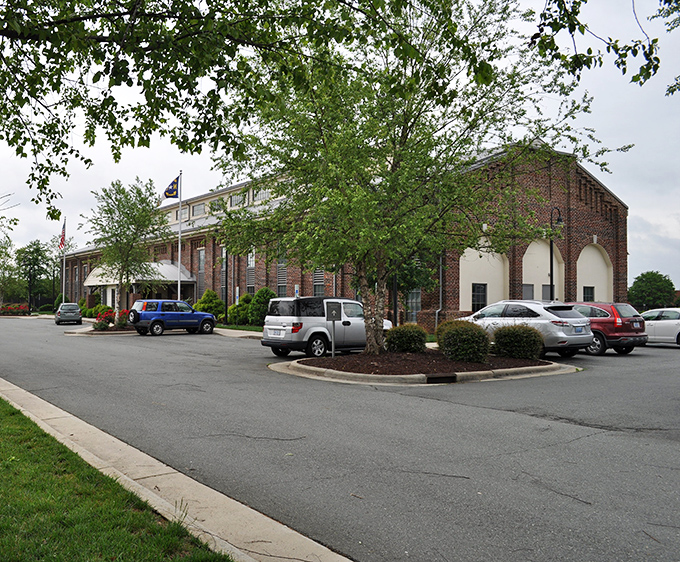 This historic brick building has witnessed Burlington's evolution from textile powerhouse to charming destination, standing proud through decades of change.