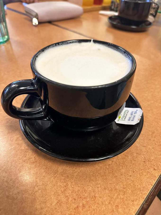 Coffee served in a proper mug, not those thimble-sized cups that leave you begging for more. This is a serious commitment to caffeine.